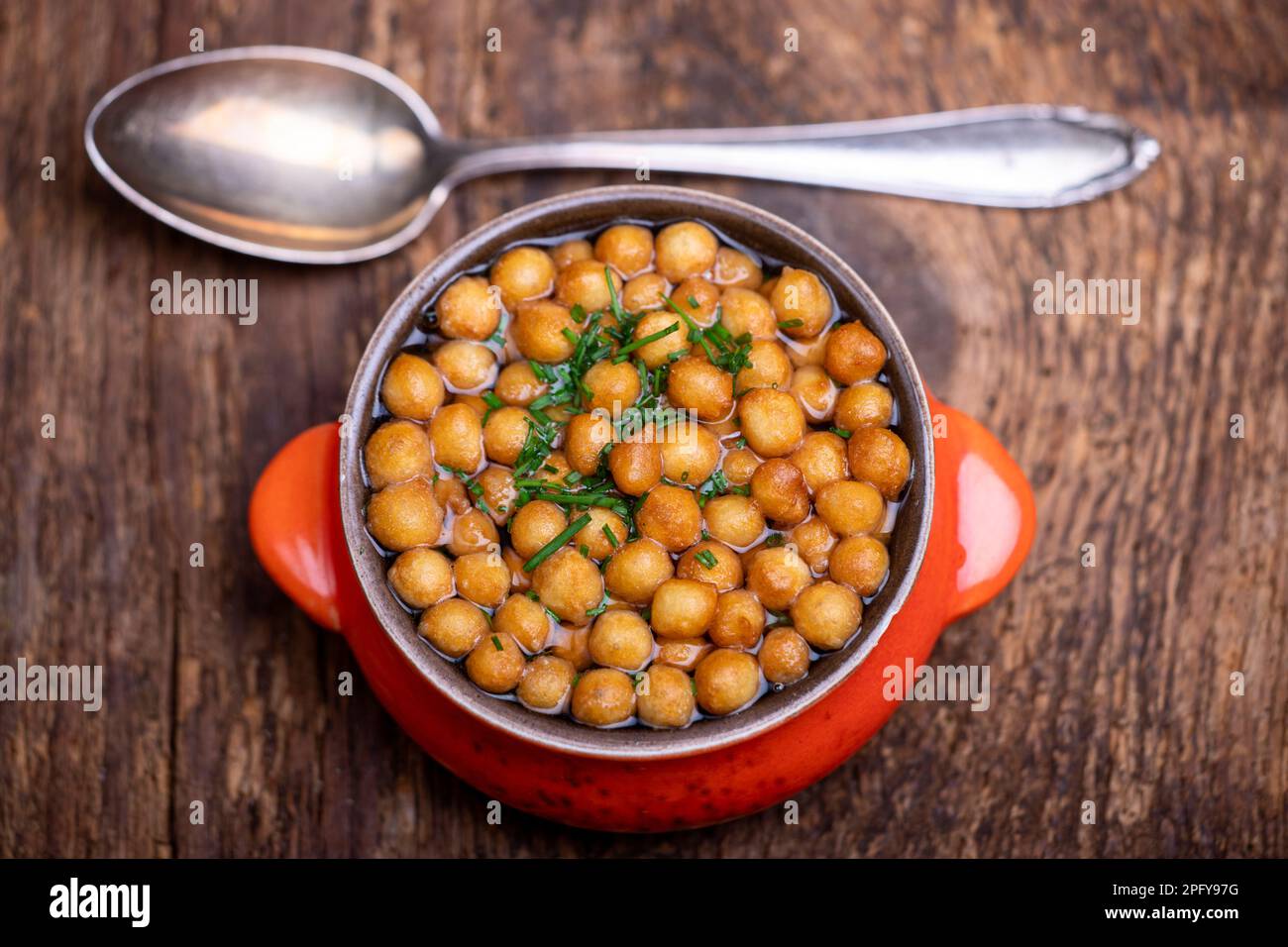 bavarian soup with batter pearls on wood Stock Photo - Alamy