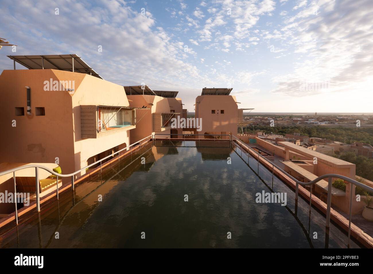 Nefta, Tunisia. 27th Feb, 2023. Clouds are reflected in the pool of the ...