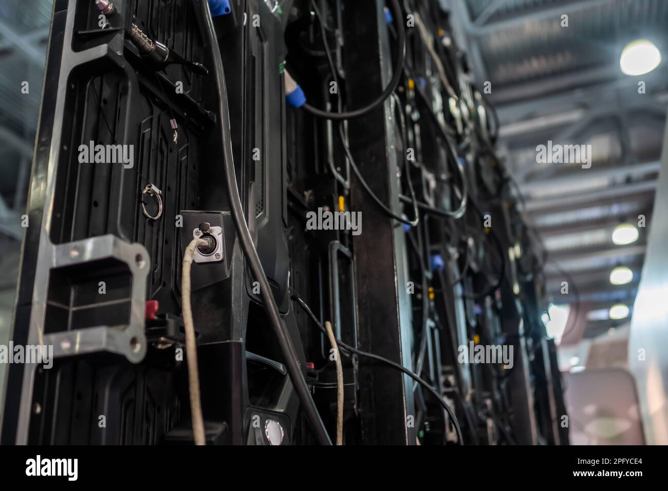 Back side of large combined advertising LED display with cables wire ...