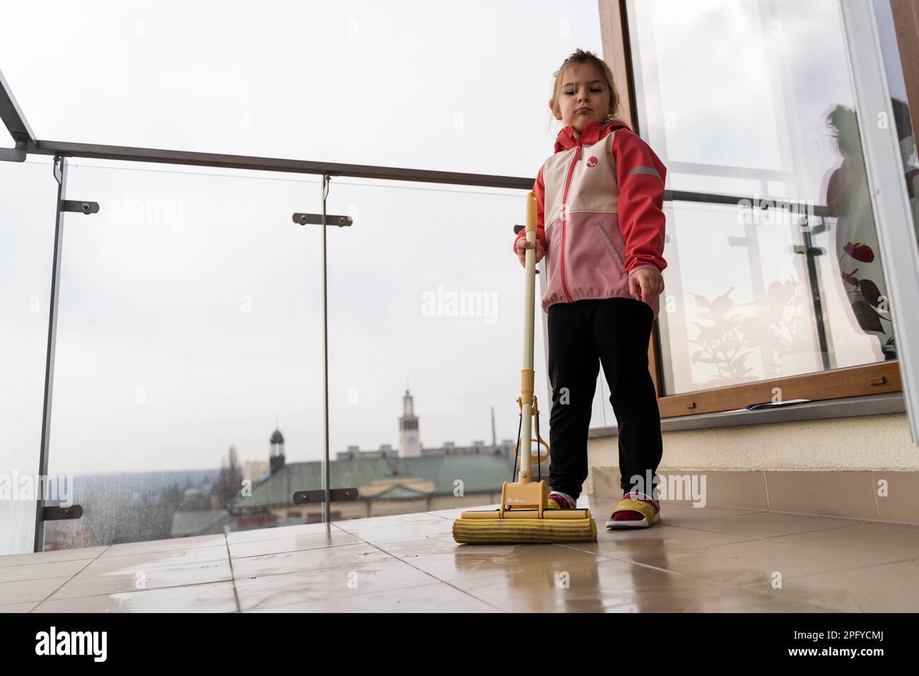 Child sweeping floor hi-res stock photography and images - Alamy