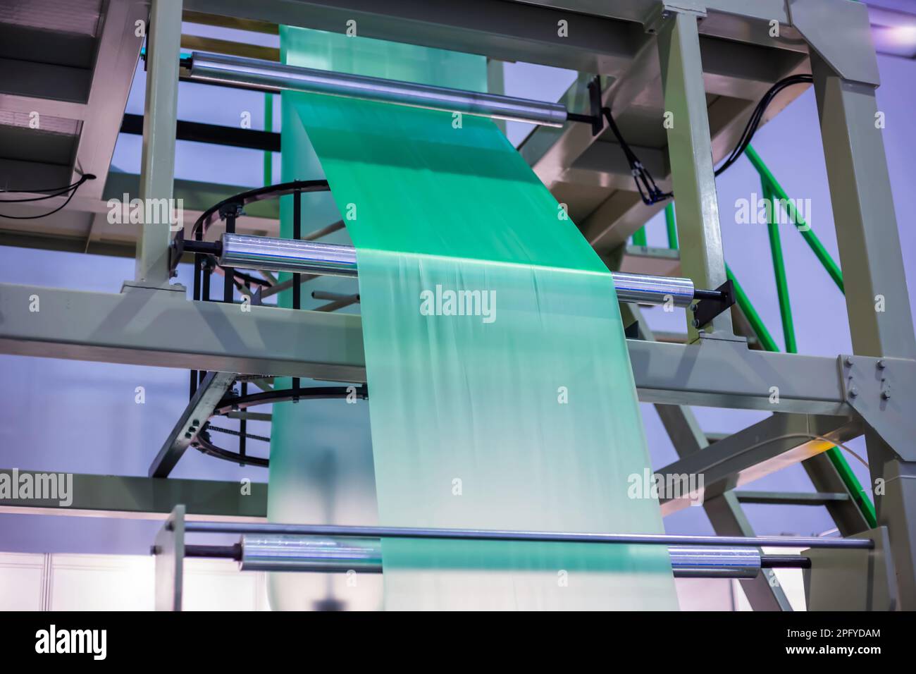 Automatic plastic bag making machine with green polyethylene film Stock ...