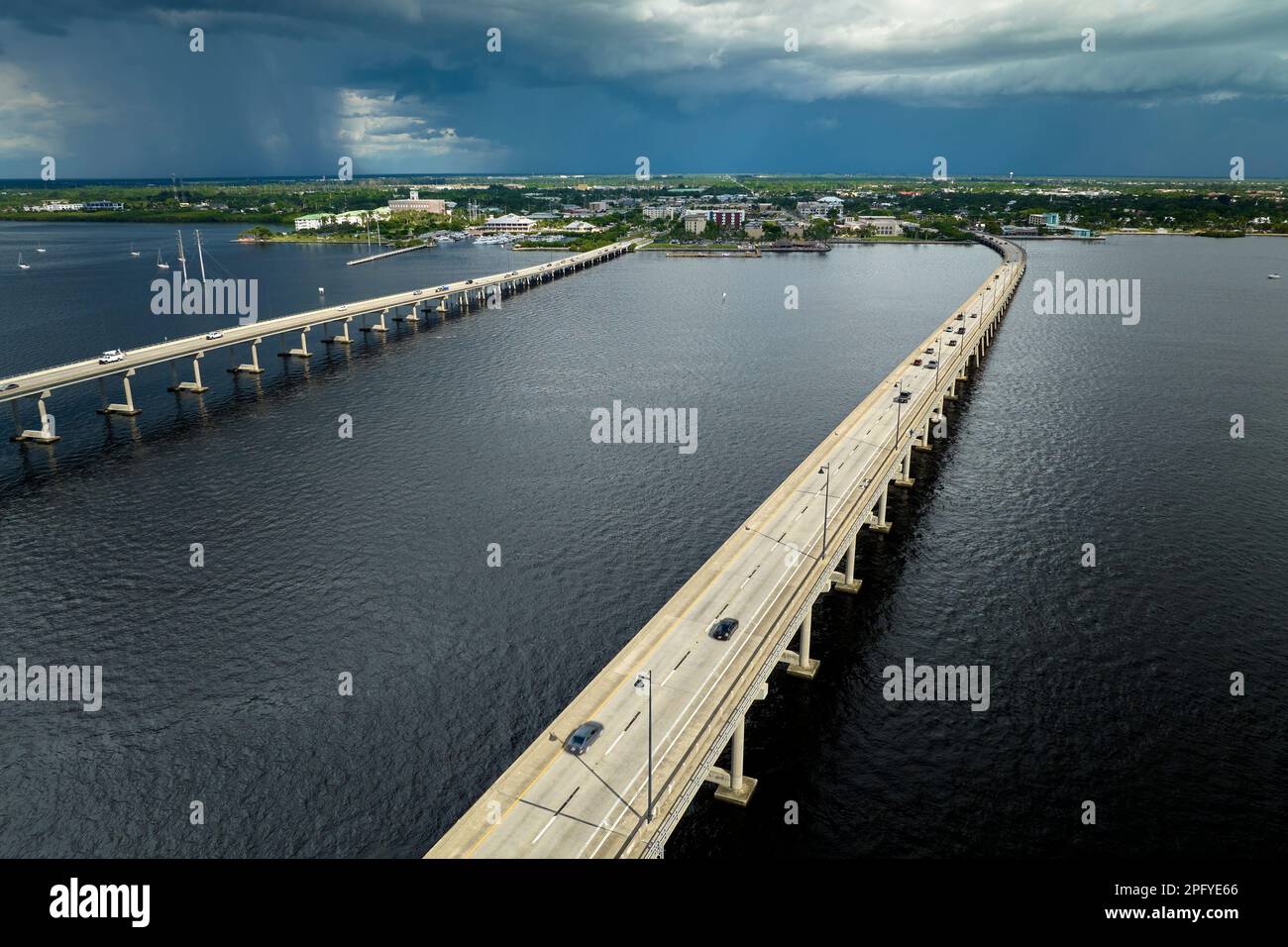 Barron Collier Bridge and Gilchrist Bridge in Florida with moving ...
