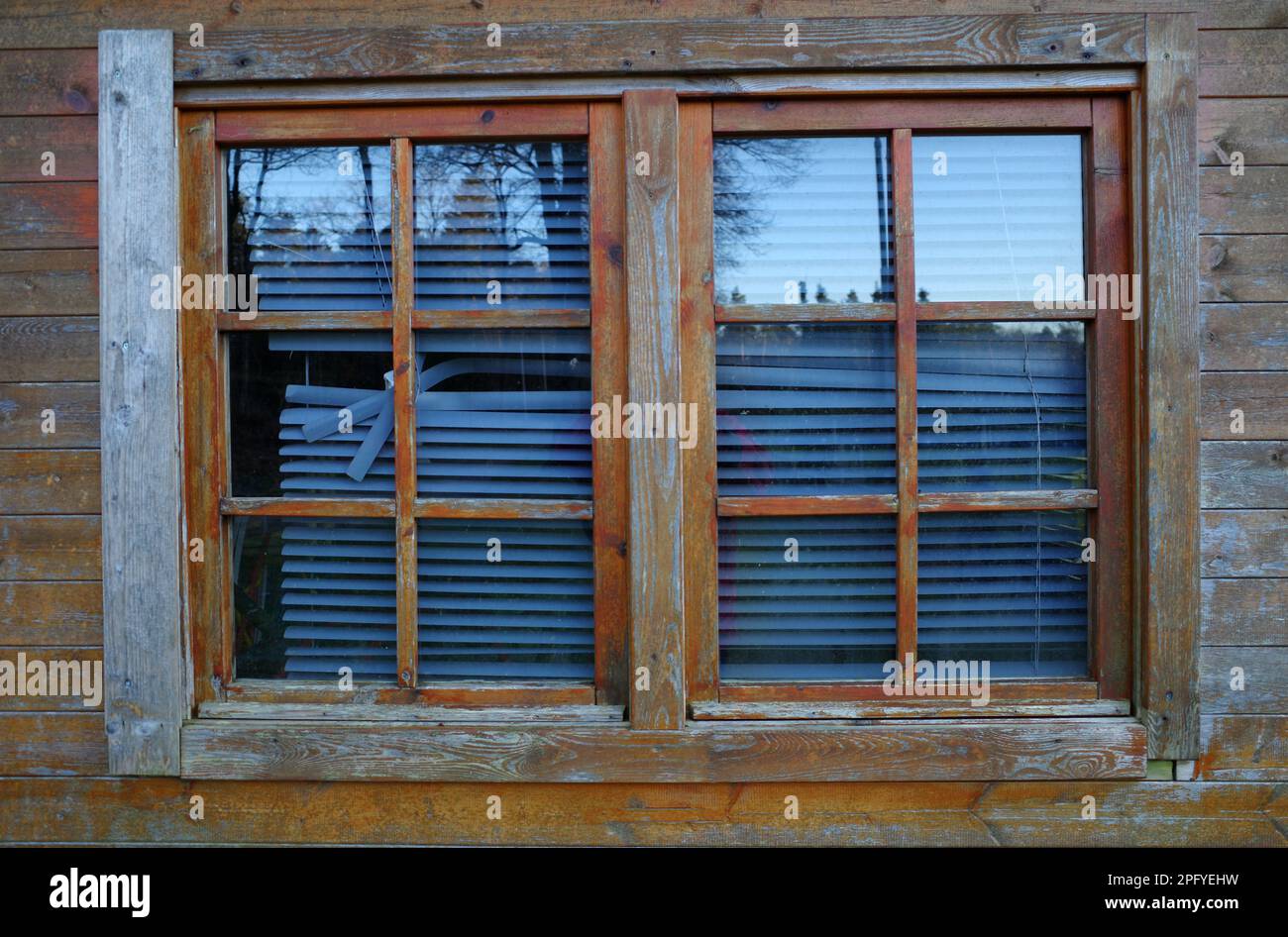 Stained glass window in timber house hi-res stock photography and ...