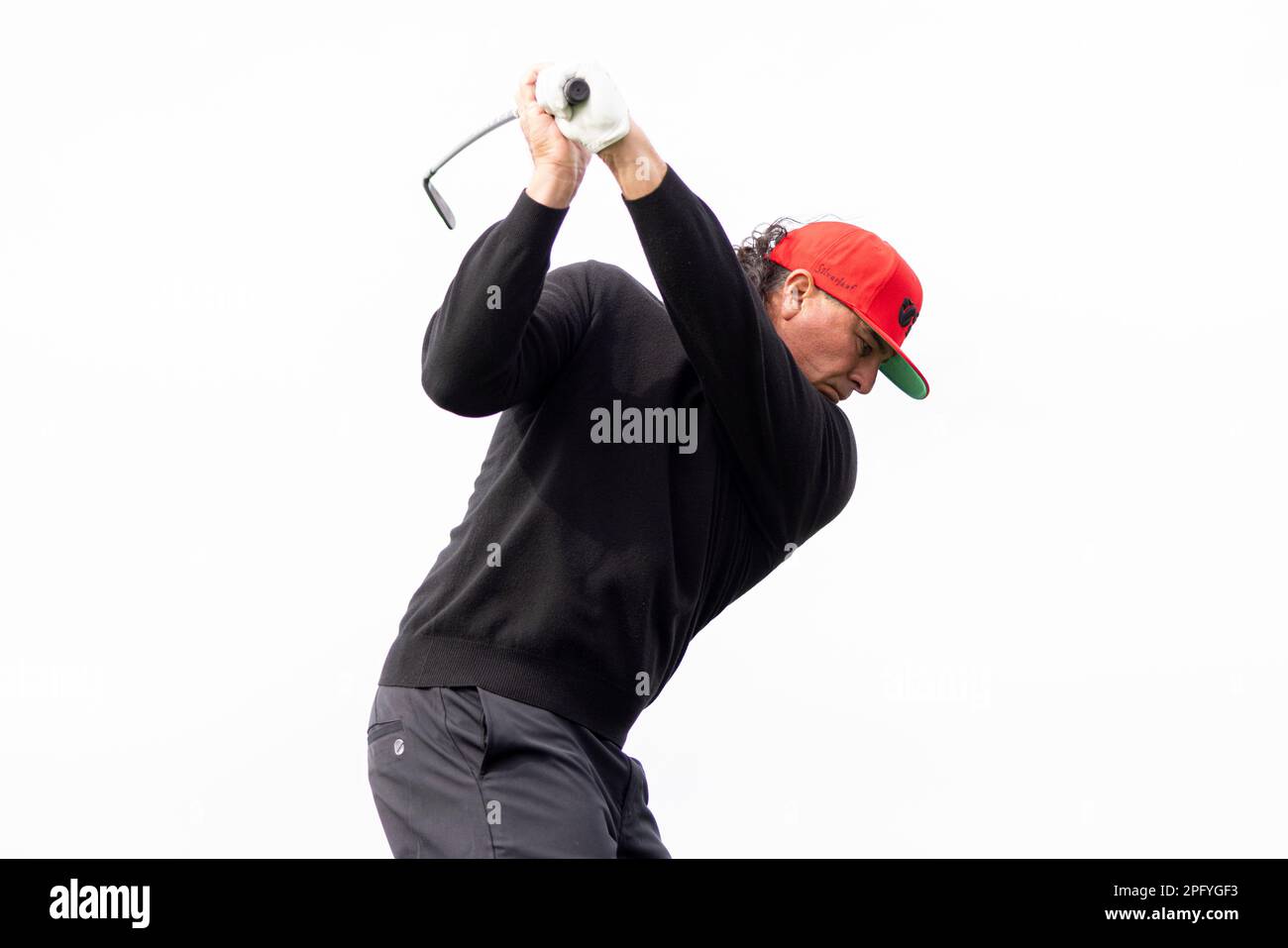 Pat Perez of 4Aces GC hits his shot on the driving range during the ...