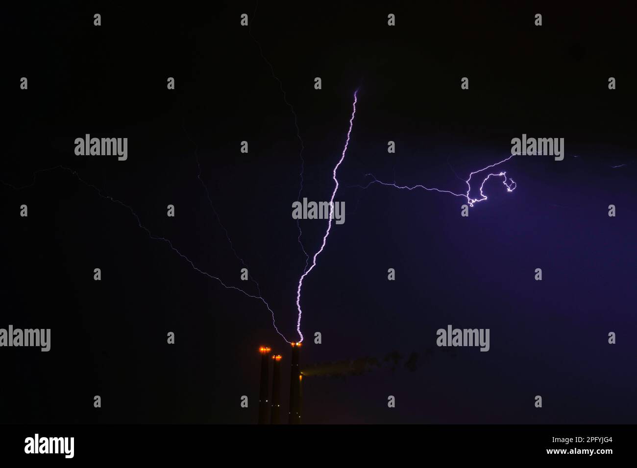 Lightning hits the main chimney of Orot Rabin power plant near Hadera ...