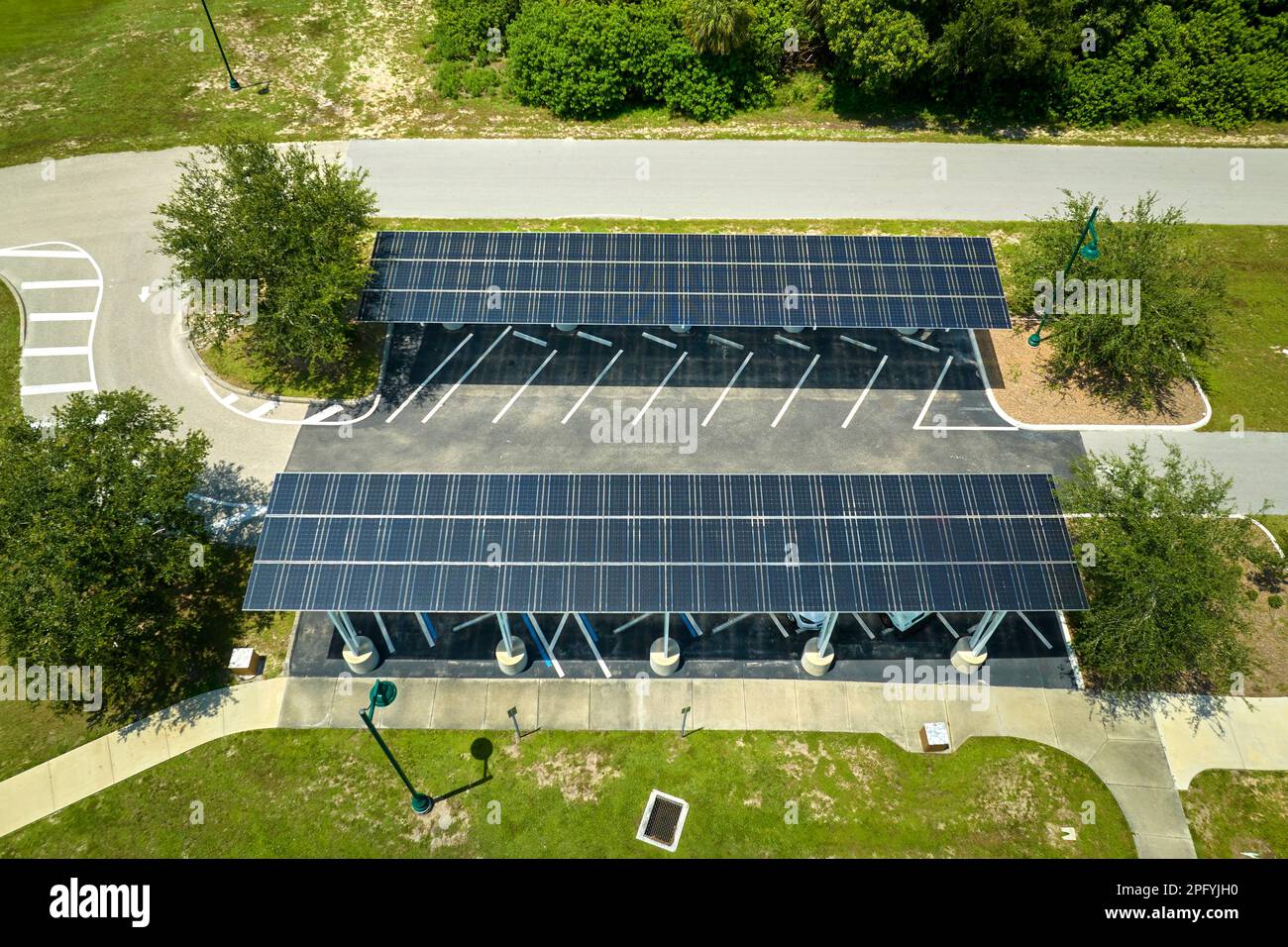 Aerial view of solar panels installed as shade roof over parking lot ...