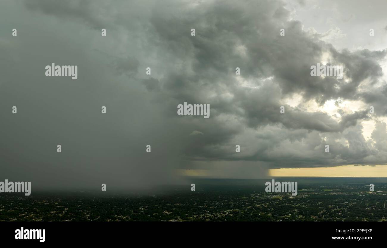 Dark stormy clouds forming on gloomy sky during heavy rainfall season ...