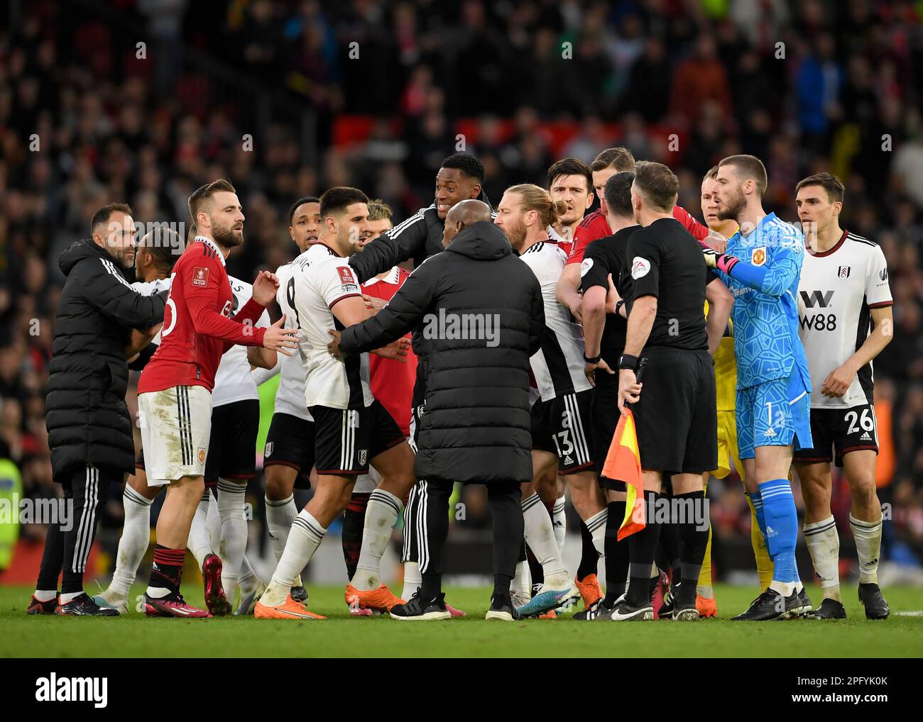 Manchester, UK. 19th Mar, 2023. Referee Chris Kavanagh gives Aleksandar ...