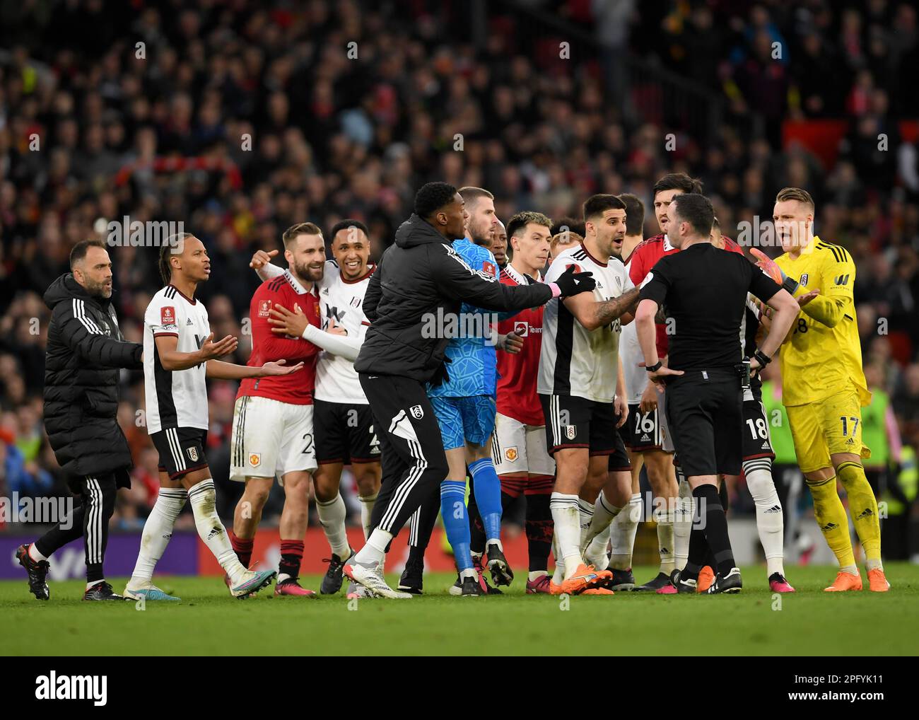 Manchester, UK. 19th Mar, 2023. Referee Chris Kavanagh gives Aleksandar ...