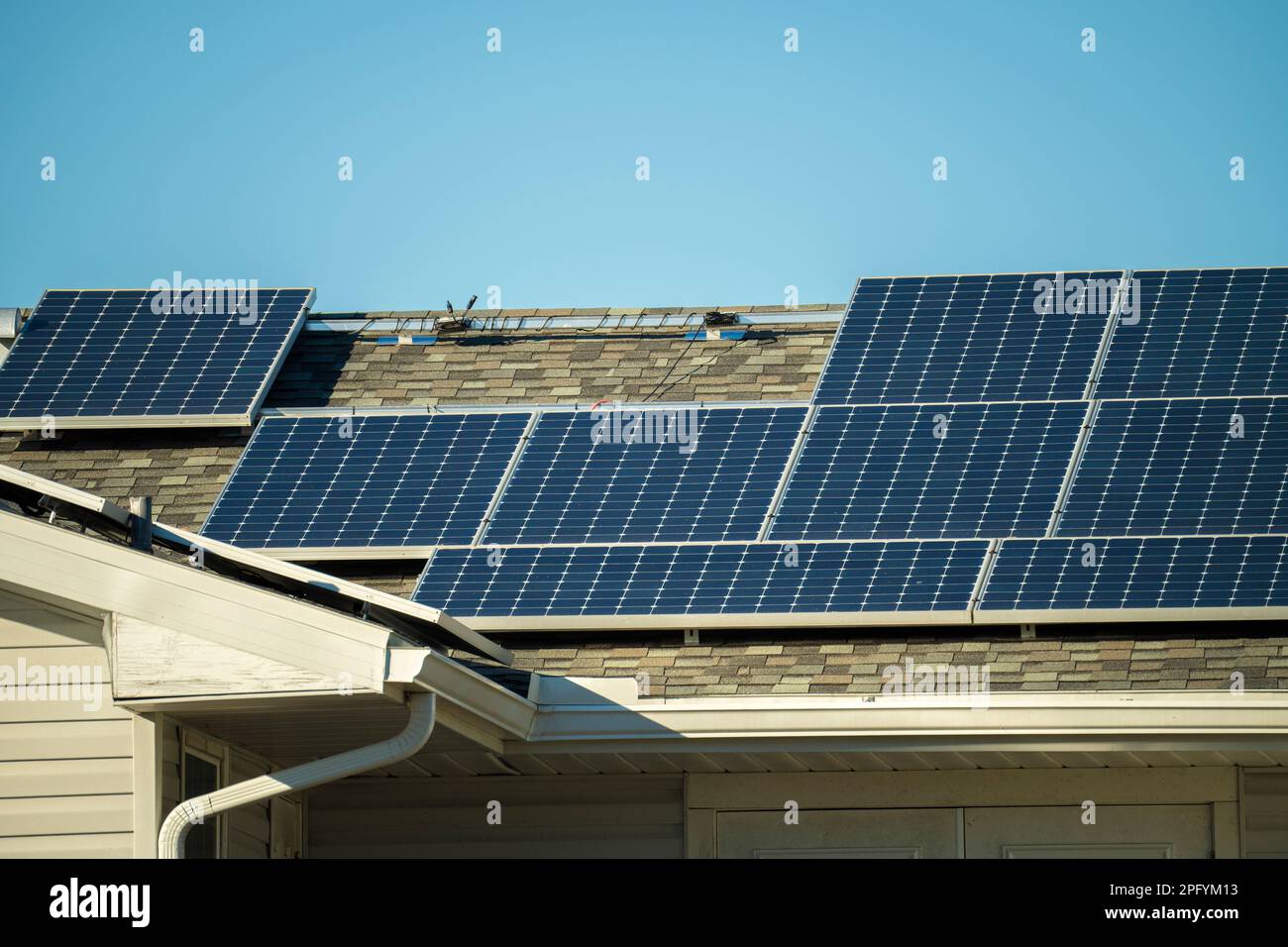 Standard american residential house with rooftop covered with solar ...