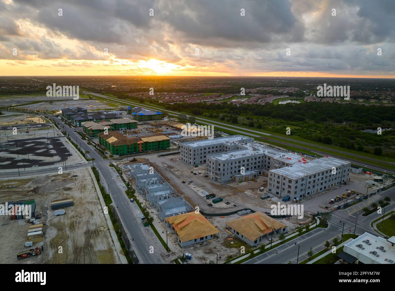 Top view of apartment buildings under construction in new developing ...