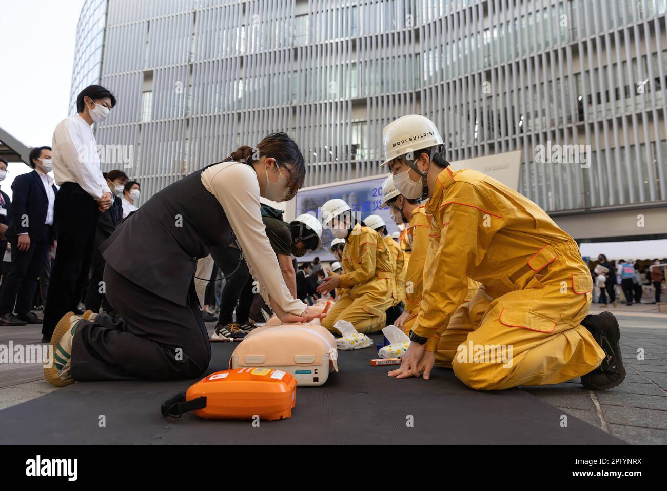 Aid under supervision hi-res stock photography and images - Alamy