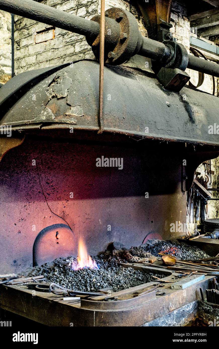 Cracked wraught iron forge hood at Combe Mill Stock Photo - Alamy