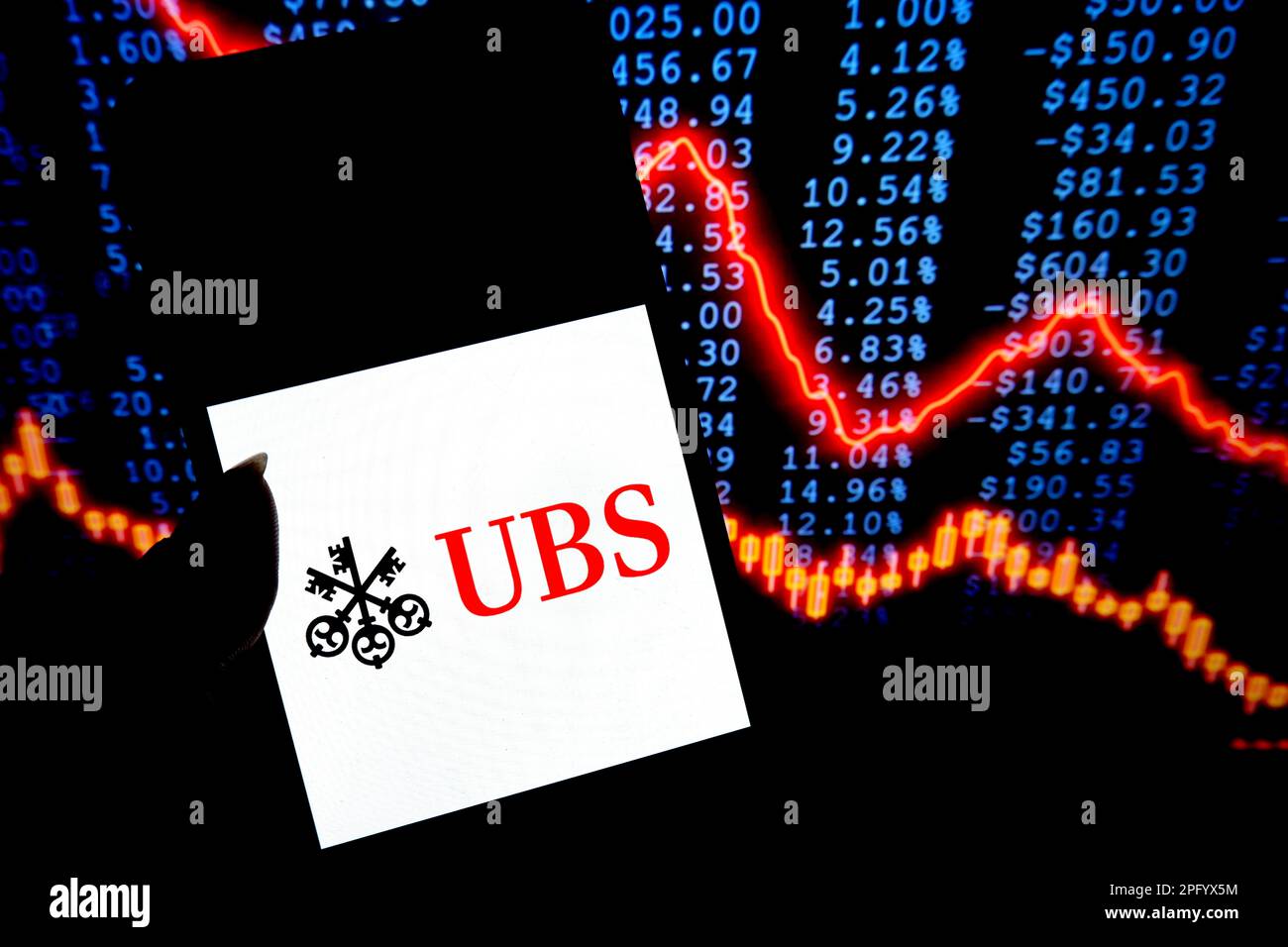 In this photo illustration, an UBS logo is seen displayed on a ...