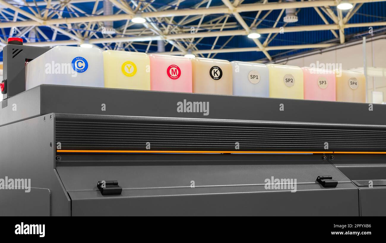 Wide-format inkjet printer. Color toners ink in the digital printer ...