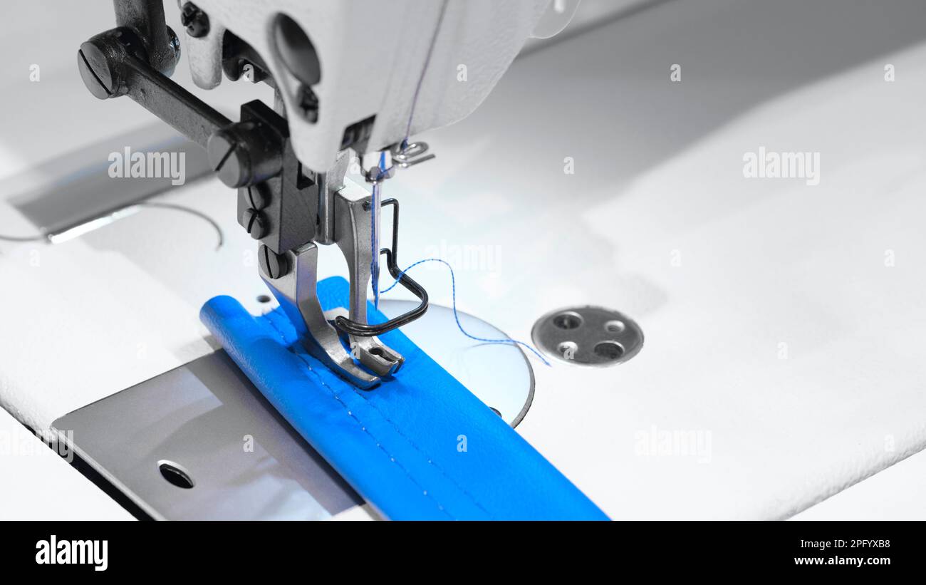 Professional sewing machine and sews garments, textile fabric ...