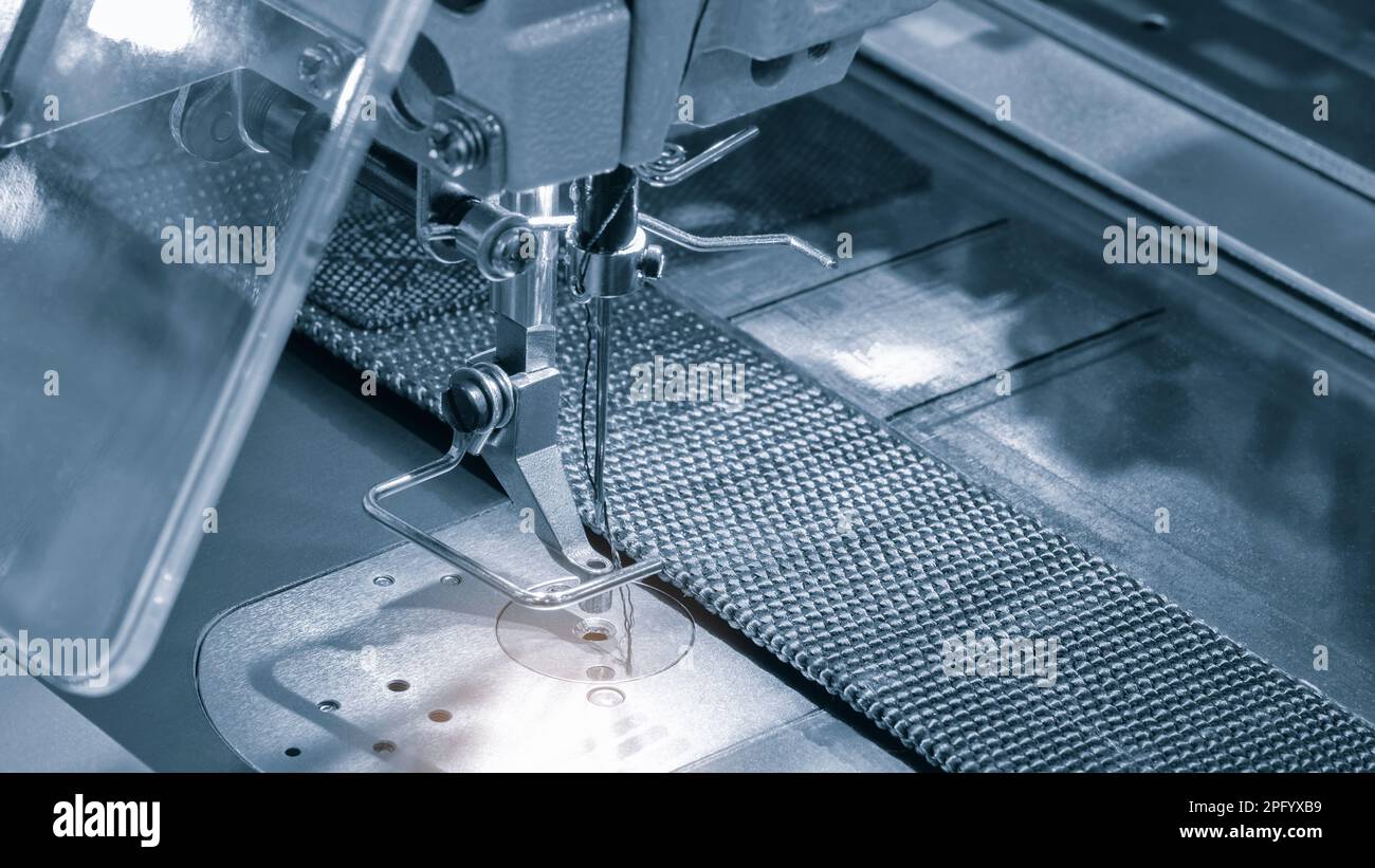 Professional sewing machine and sews garments, textile fabric ...