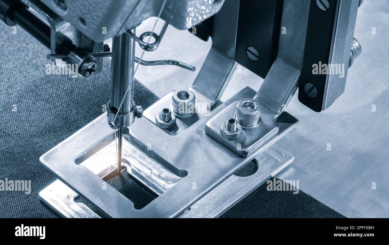 Professional sewing machine and sews garments, textile fabric ...