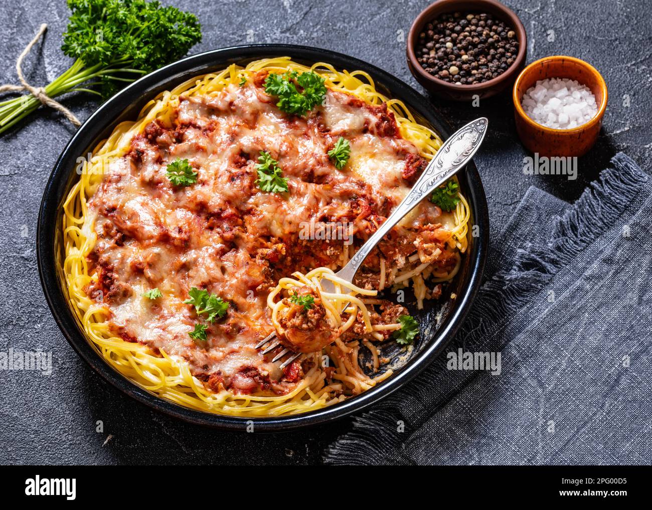 baked spaghetti layered with ground beef and marinara sauce, ricotta ...