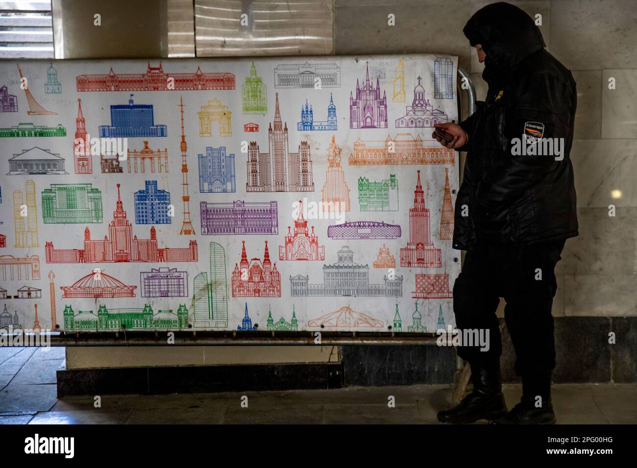Moscow, Russia. 19th of March, 2023. A security guard stands at a fence ...