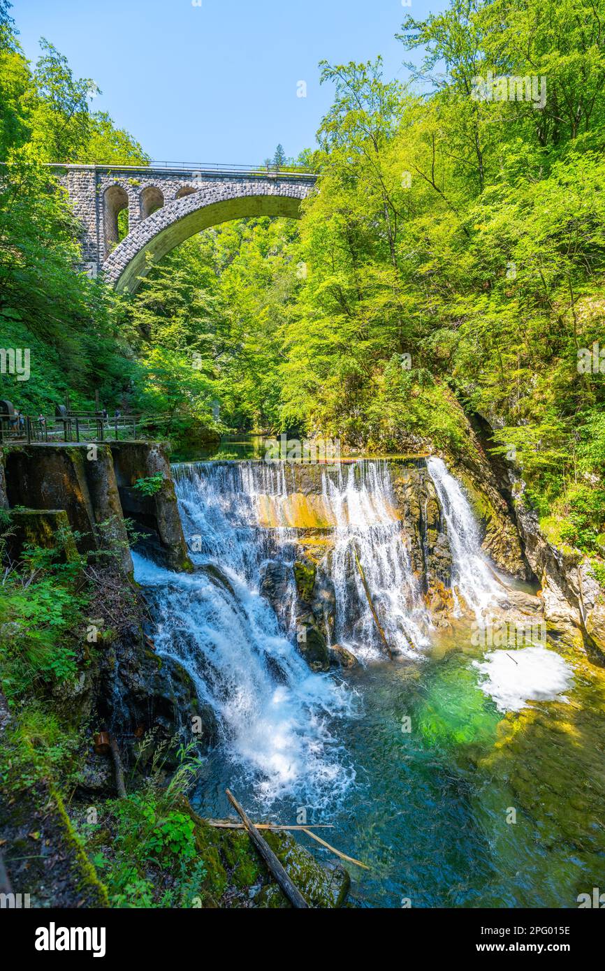 Stone railway viaduct over the Radovna river waterfall in the Vintgar ...