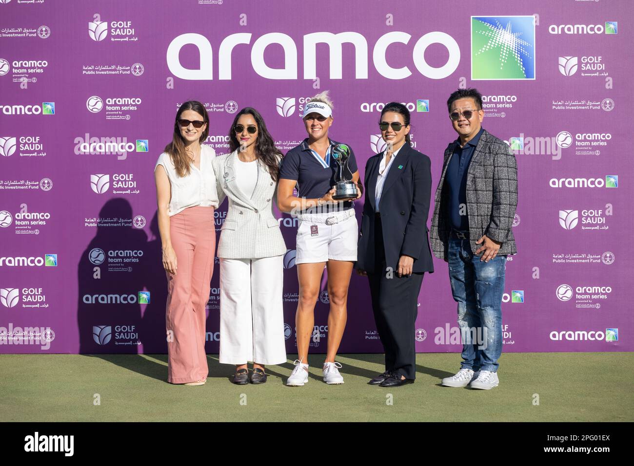 ( C ) French Pauline Roussin-Bouchard pose with her trophy during the ...