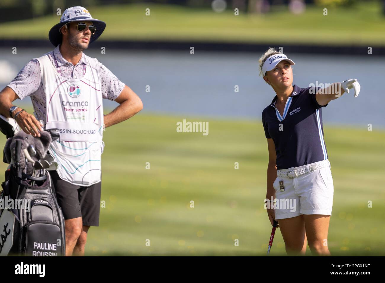 French Pauline Roussin-Bouchard talks to her caddie during the Aramco ...