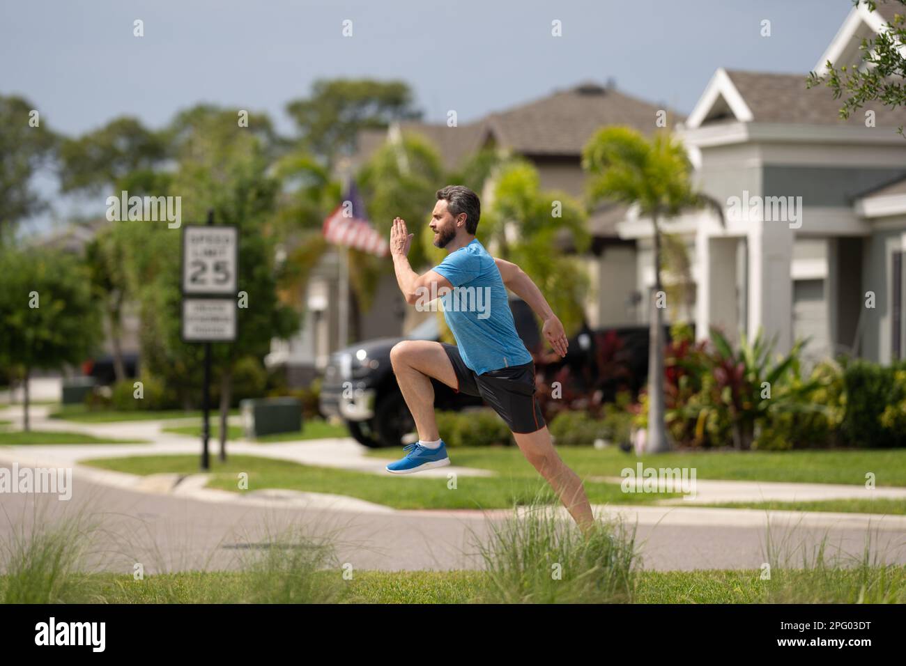 Running man sprinting workout outdoor. Fit athlete man running on ...