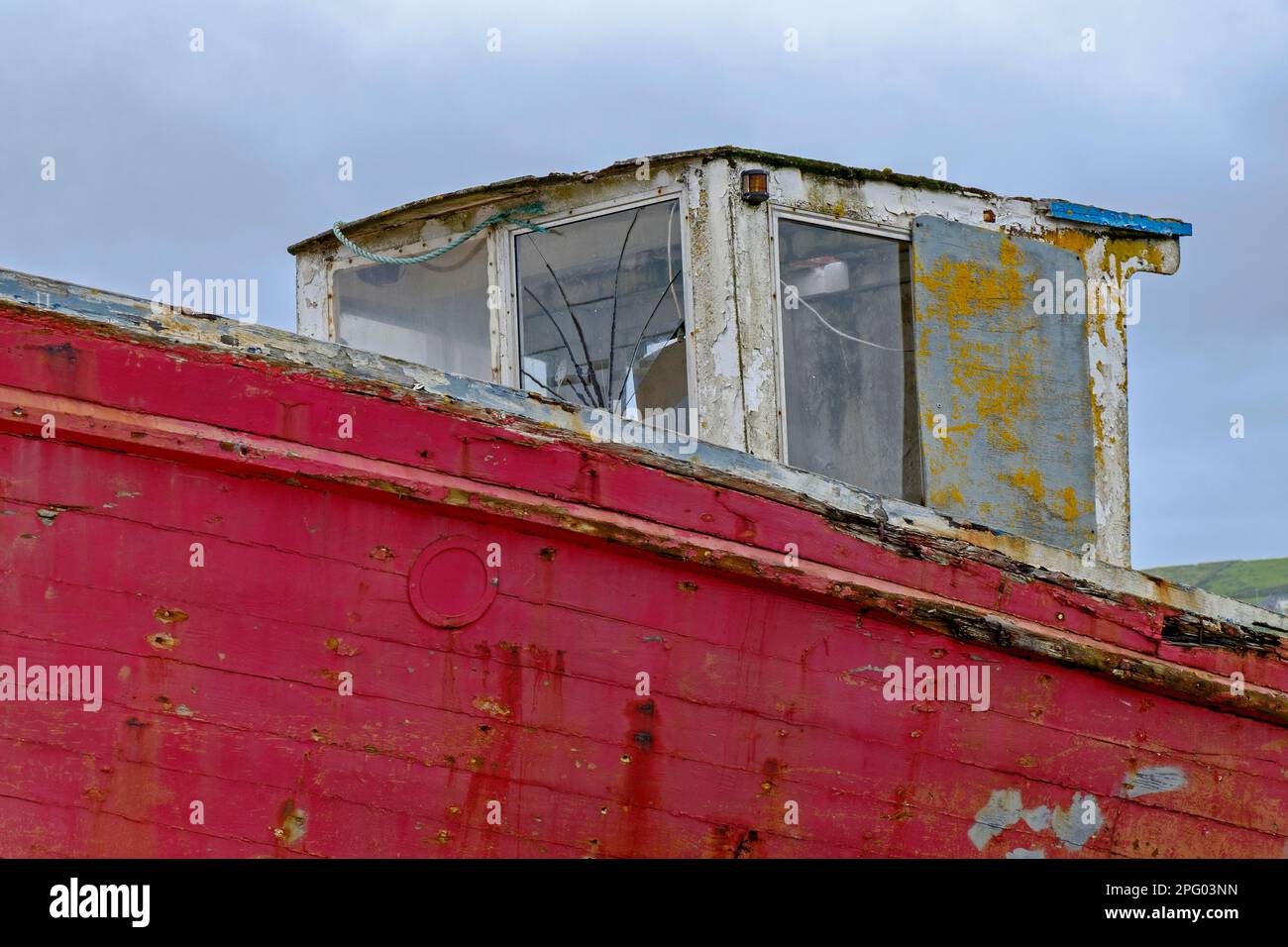A dilapidated boat in Portmaggee harbour Stock Photo - Alamy