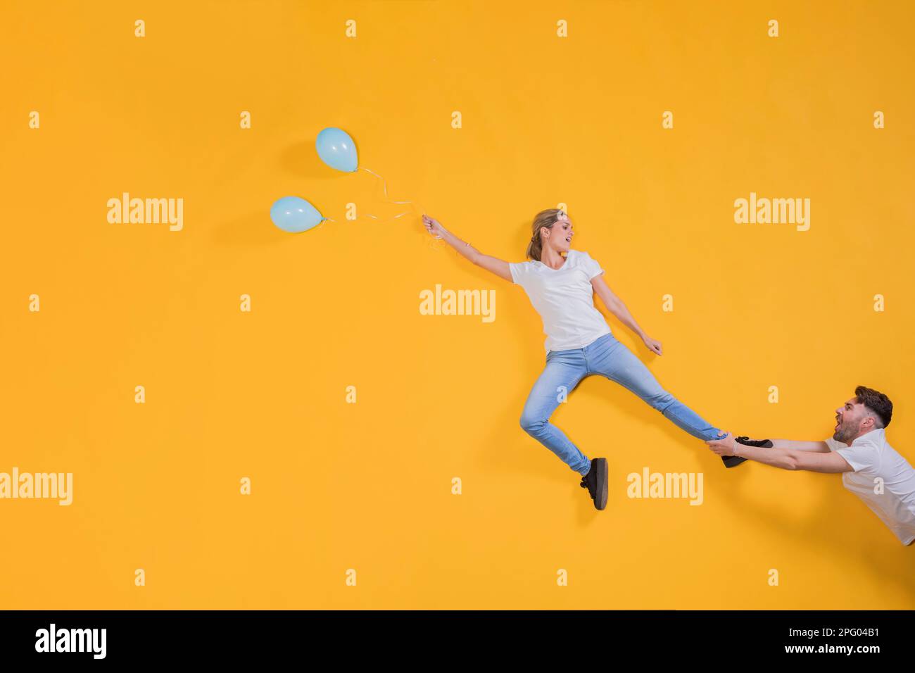couple floating air with balloons. Beautiful photo Stock Photo - Alamy