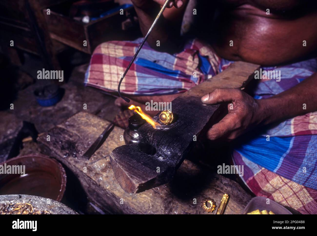 Goldsmith making Mangalya Thali in Chettinad, Tamil Nadu, South India ...