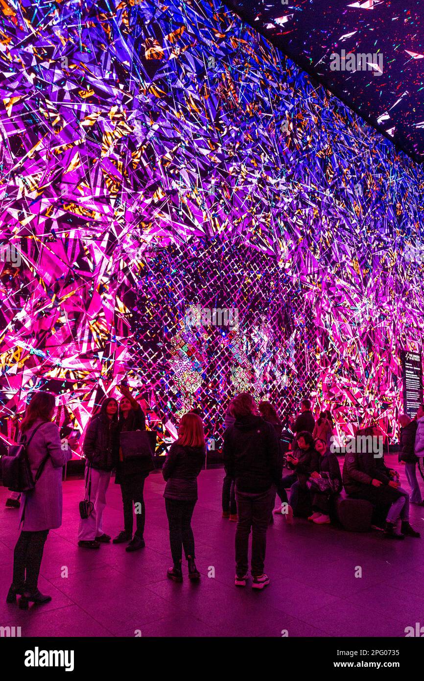 People looking at 'A Step Beyond' by light artist Rupert Newman at the ...