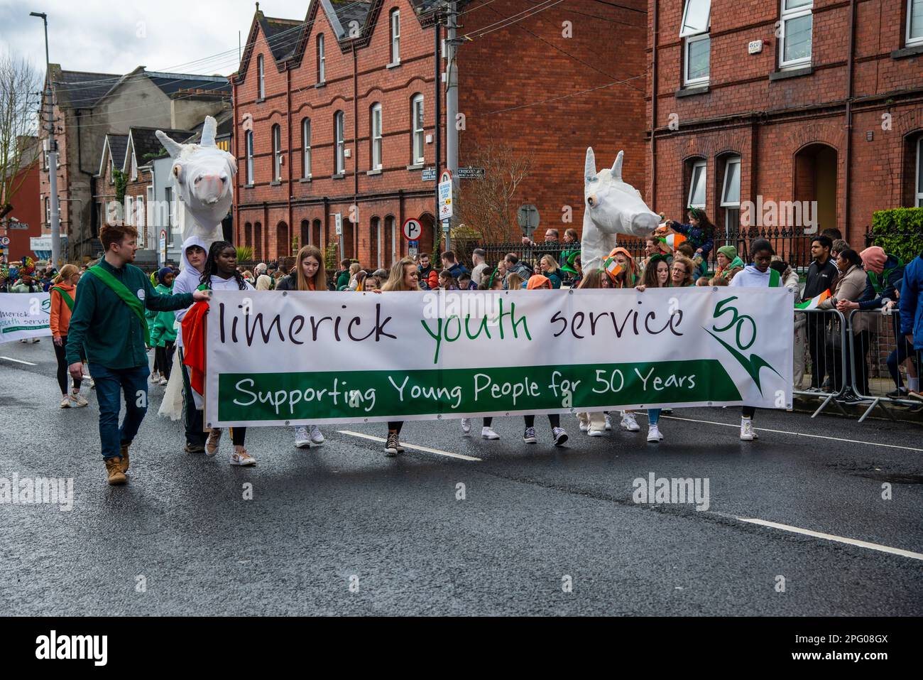 St Patrick's Day in Limerick, parade and happy people during the show ...