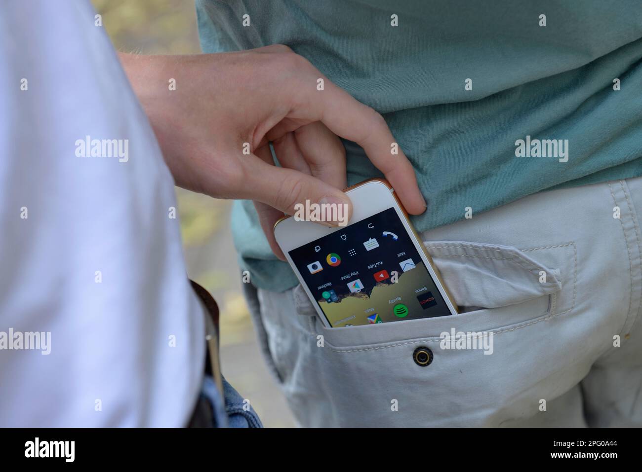 Symbol photo, pickpocketing Stock Photo - Alamy