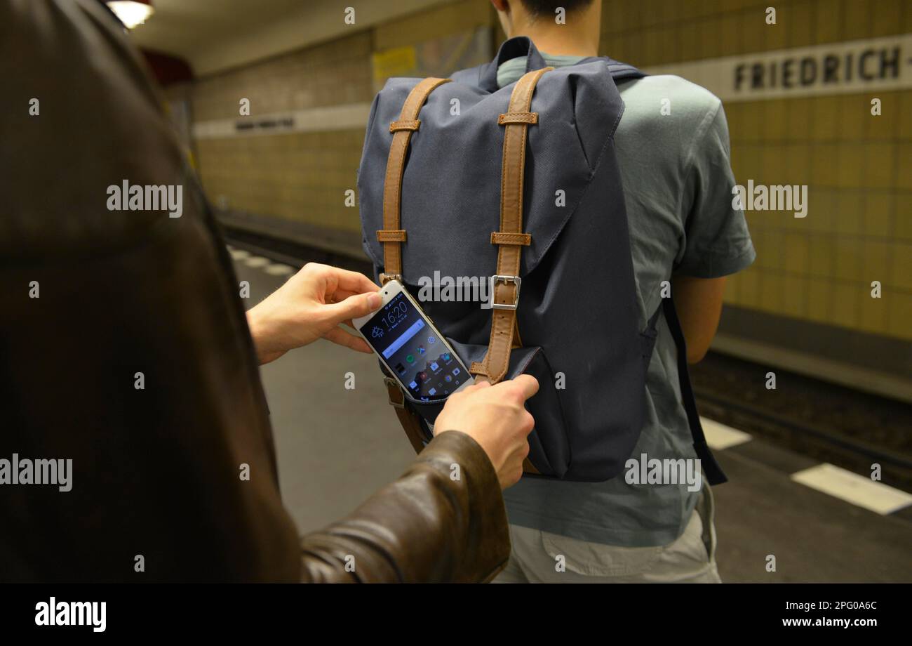 Symbol photo, pickpocketing Stock Photo - Alamy
