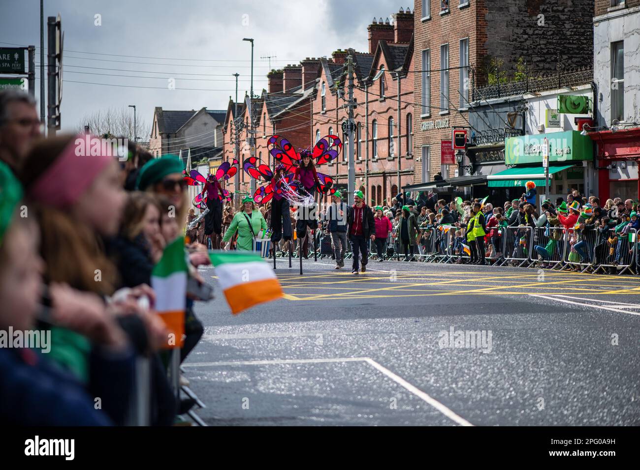 St Patrick's Day in Limerick, parade and happy people during the show ...