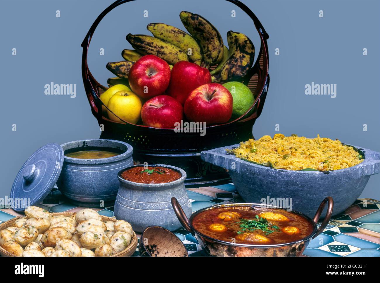 Cutout, Traditional Chettinad food, kulipaniyaram, vegetable rice sevai ...