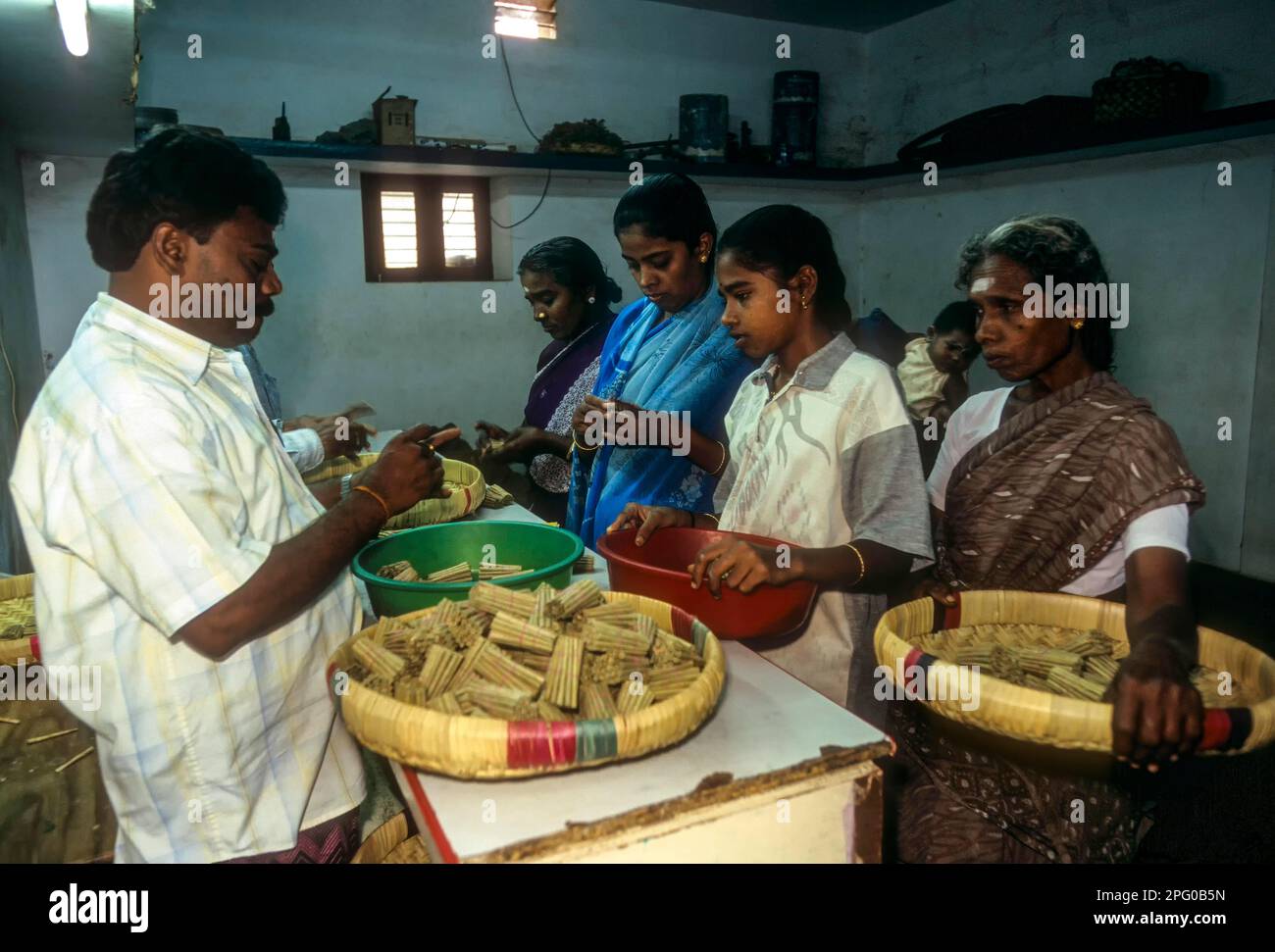 Rolled beedis being delivered by the women to the beedi company, Tamil ...