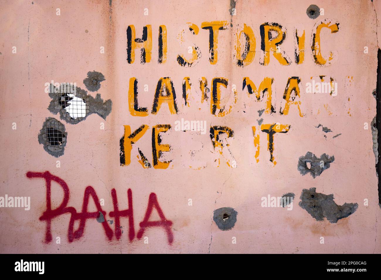 Fading old sign written on the side of building at Garlock Ghost Town ...