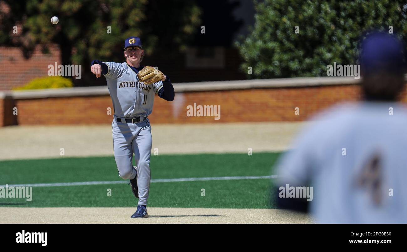 March 19, 2023: Notre Dame sophomore Jack Penney (11) throws to first ...