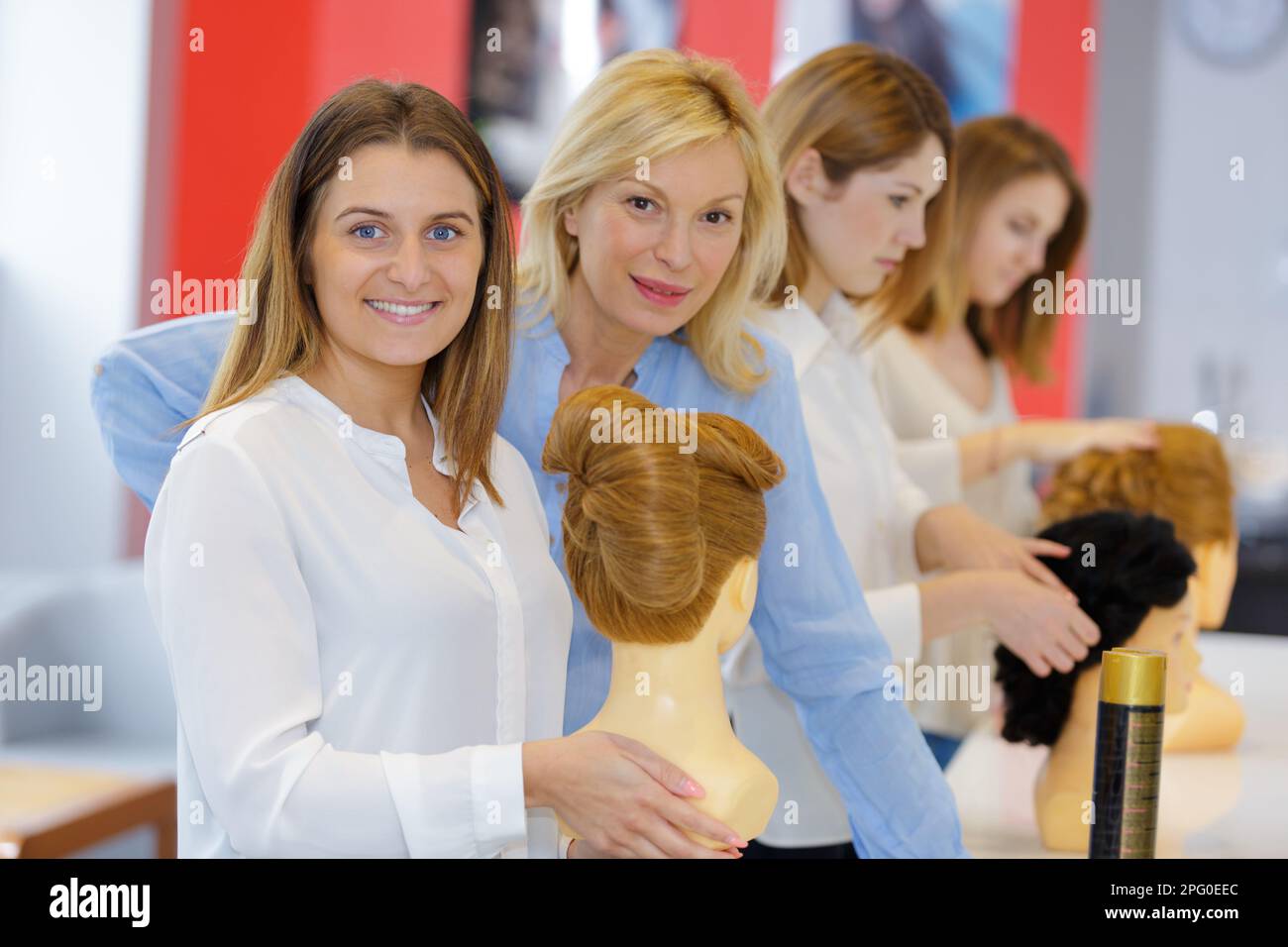 learning how to become a hairdresser Stock Photo - Alamy
