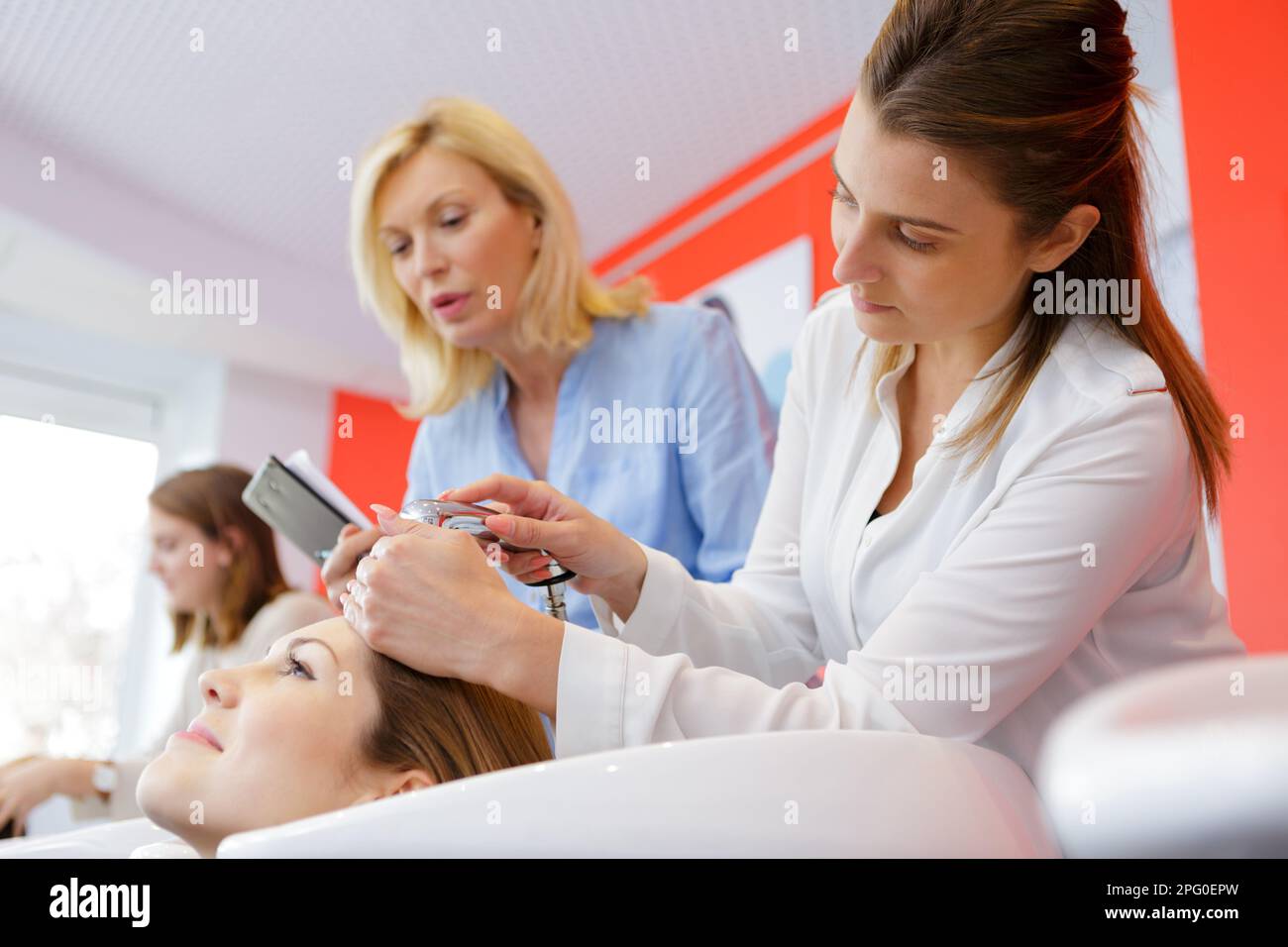 woman doing an hairdresser exam Stock Photo - Alamy