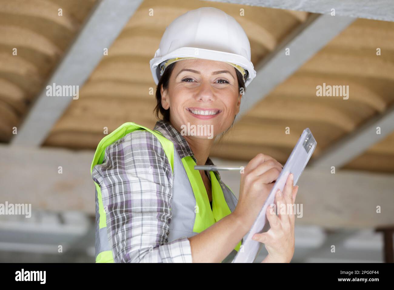Female engineer checking list hi-res stock photography and images - Alamy