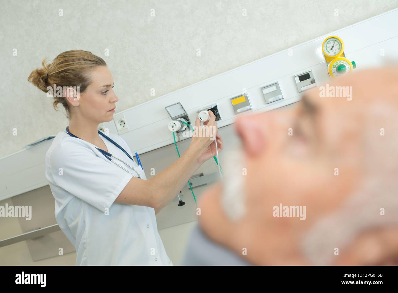 female doctor hold a power plug Stock Photo - Alamy