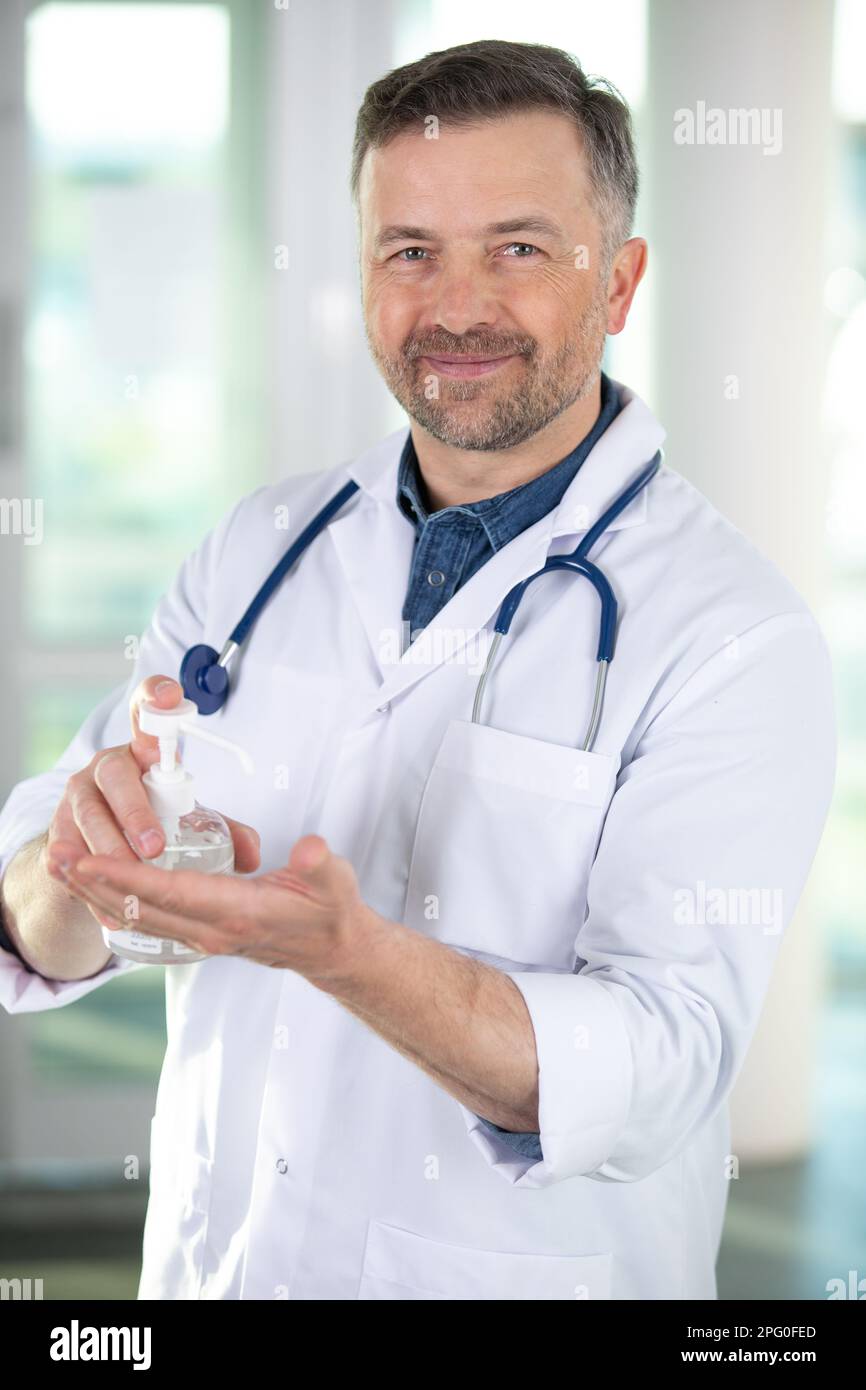Middle aged man washing hands hi-res stock photography and images - Alamy