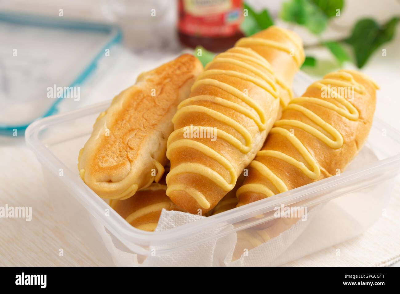 Homemade asian bread in container Stock Photo - Alamy