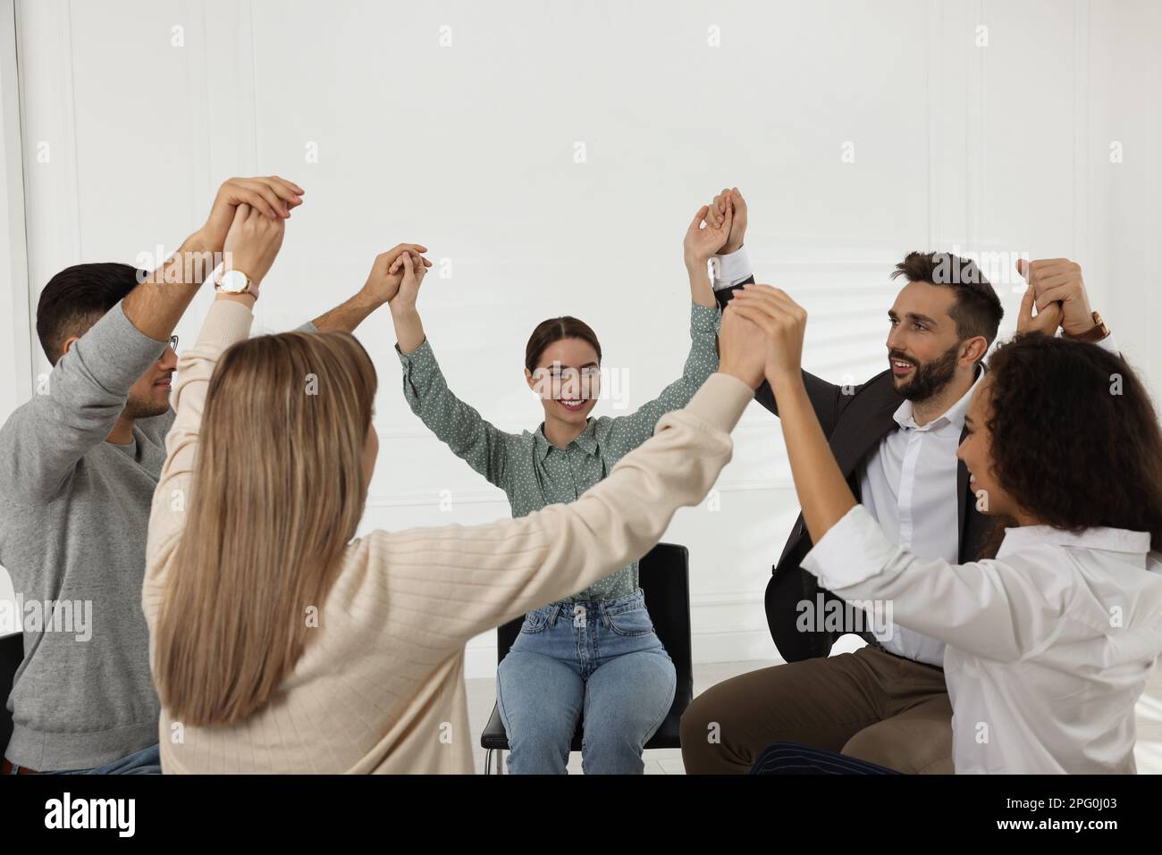 Group holding hands therapy hi-res stock photography and images - Alamy