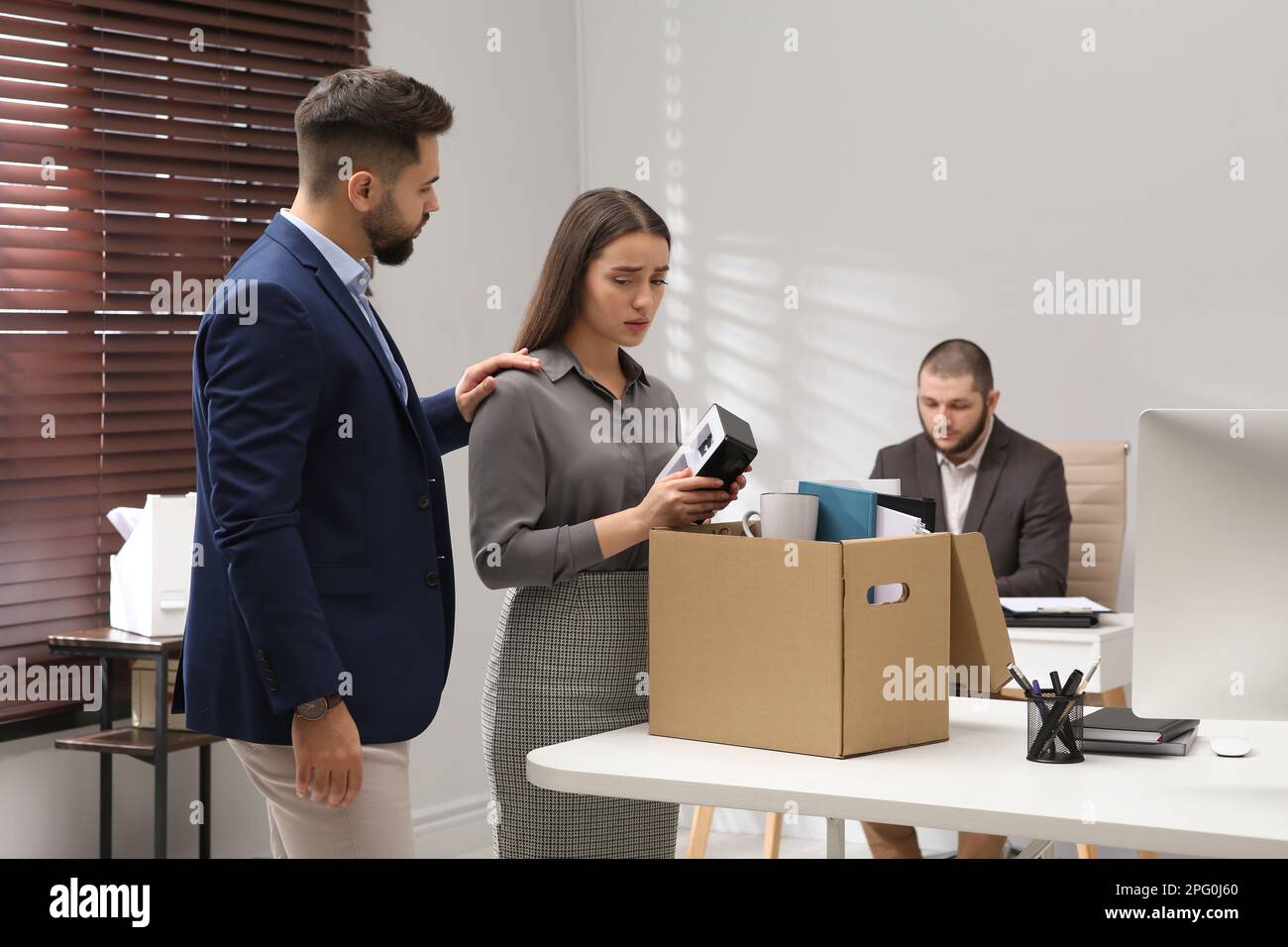 Comforting employee hi-res stock photography and images - Alamy