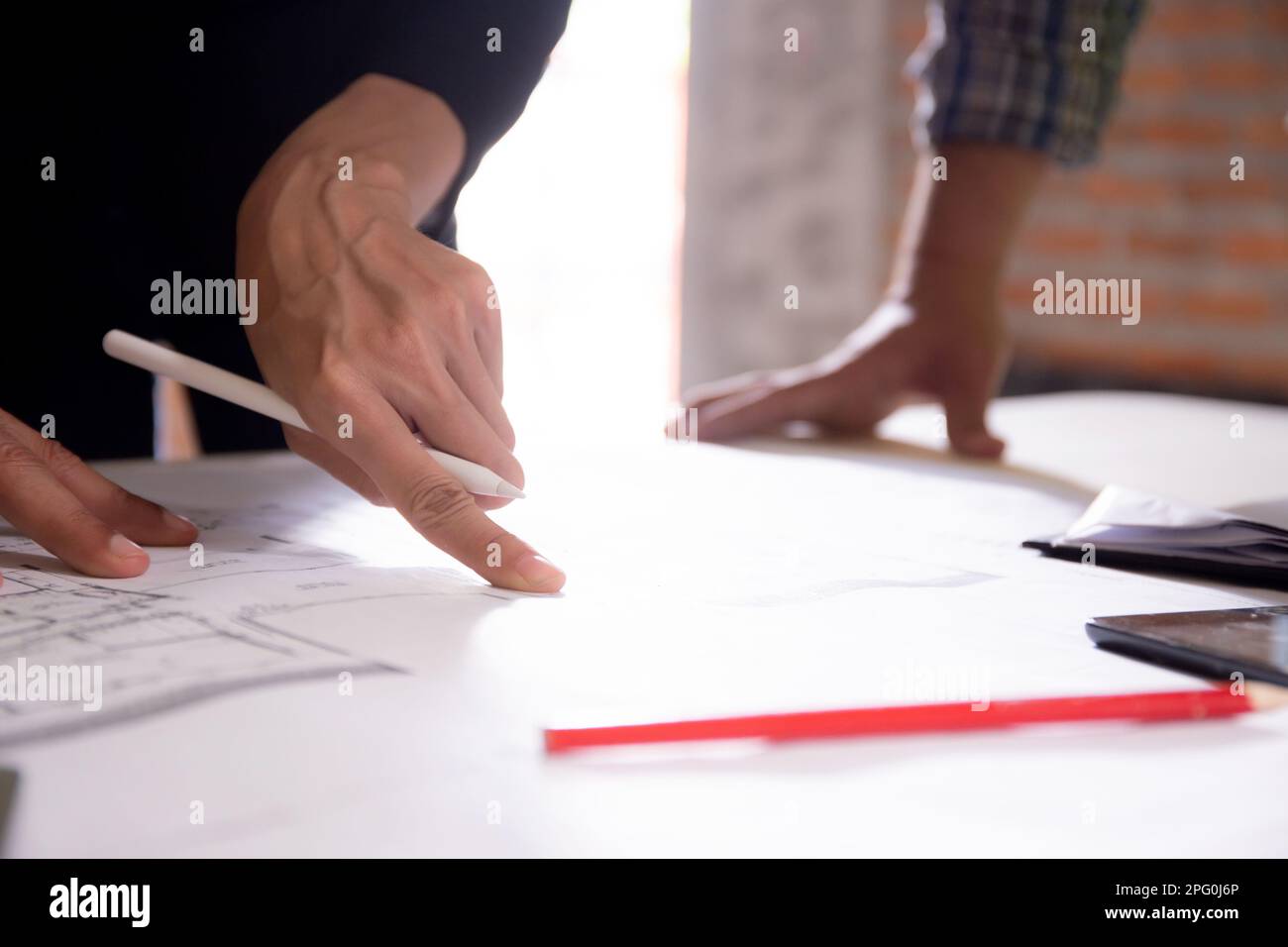 Closeup hands young caucasian architect woman looking laptop and ...