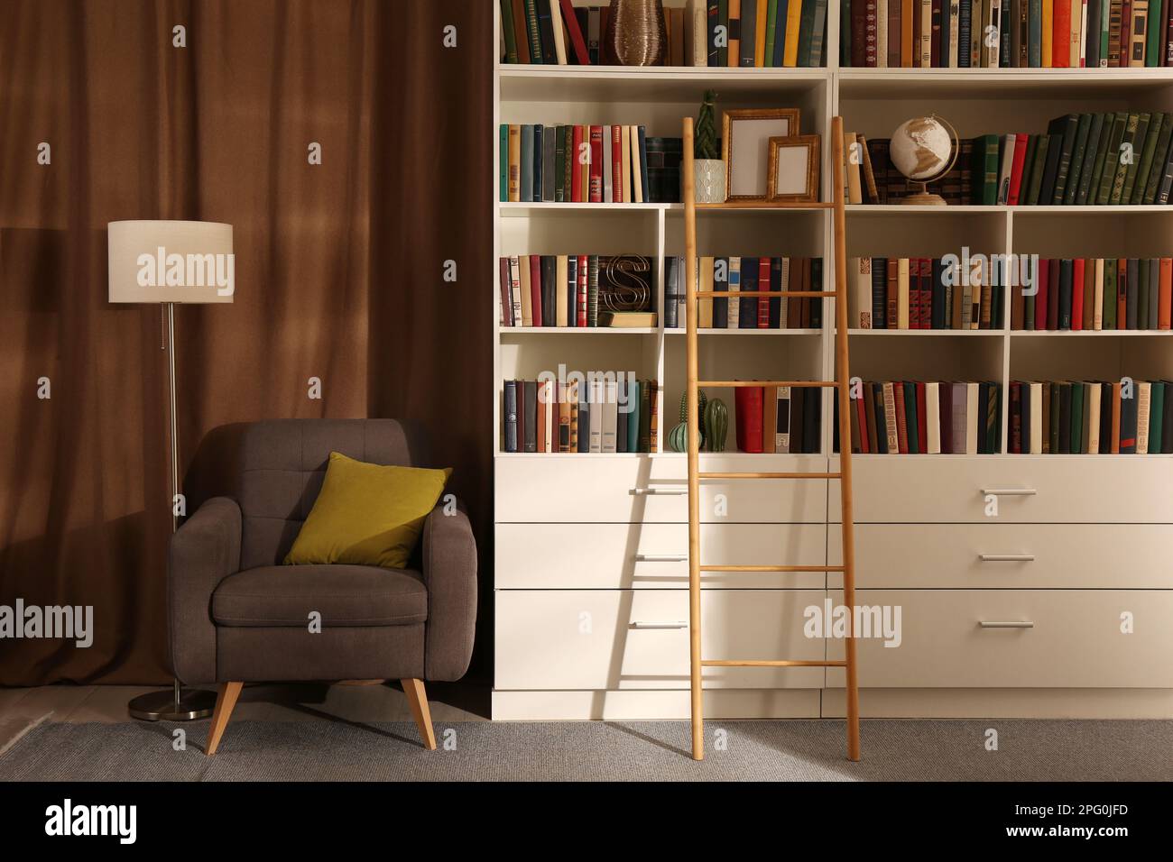 Cozy home library interior with collection of different books on ...